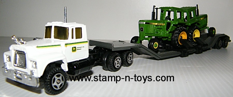 Ertl013 Mack R-Model Daycab w/Lowboy & (2) Farm Tractors for the load ...